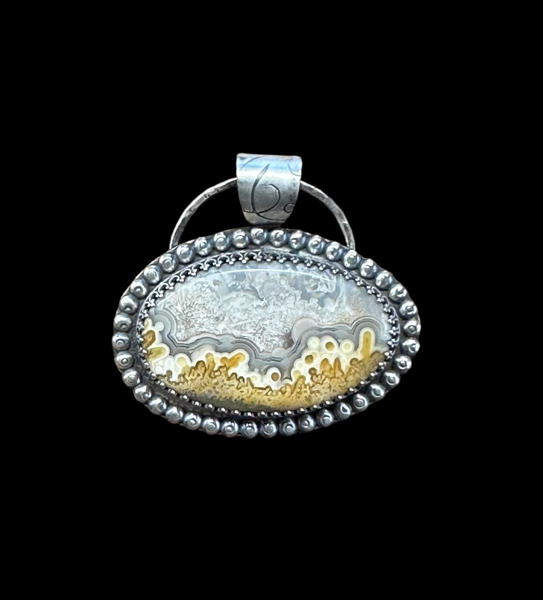 Crazy Lace Agate sterling silver pendant. $70 – Cool Stones Hot Rocks